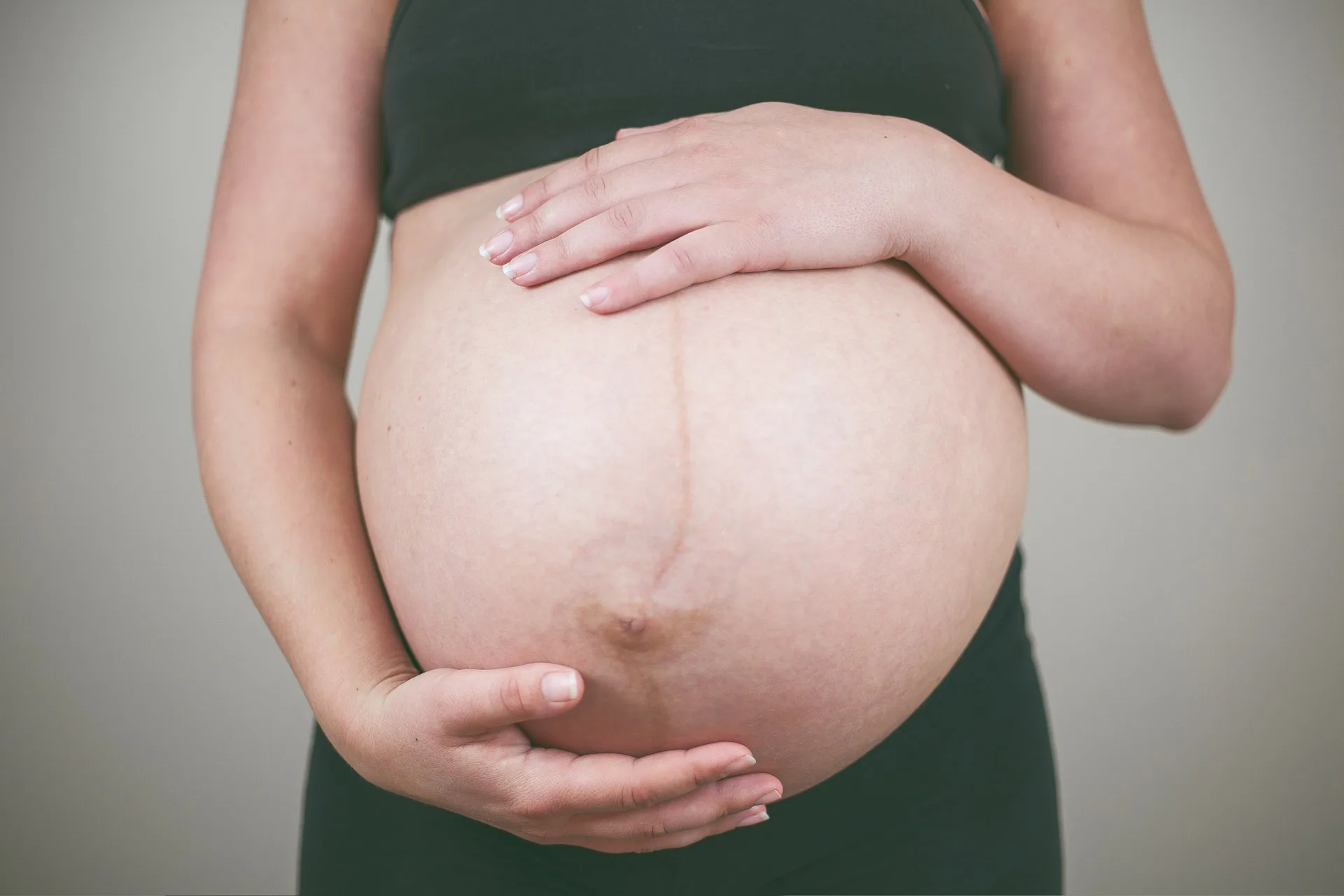 The Postpartum Milestones You'll Reach, A Month By Month Guide