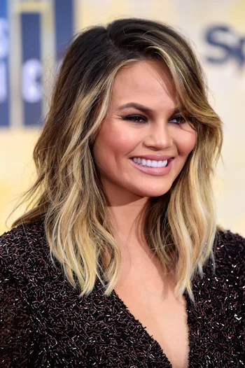 11 Celebrity Moms Who Aren't Afraid To Flaunt Their Stretch Marks