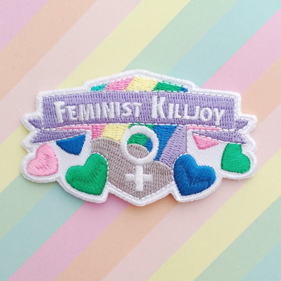 9 Feminist Pins & Patches To Wear To The Women's Strike