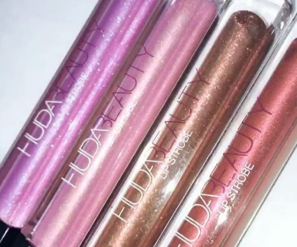 Huda Beauty Created A Highlighter For Your Lips & The First Look Is Magical