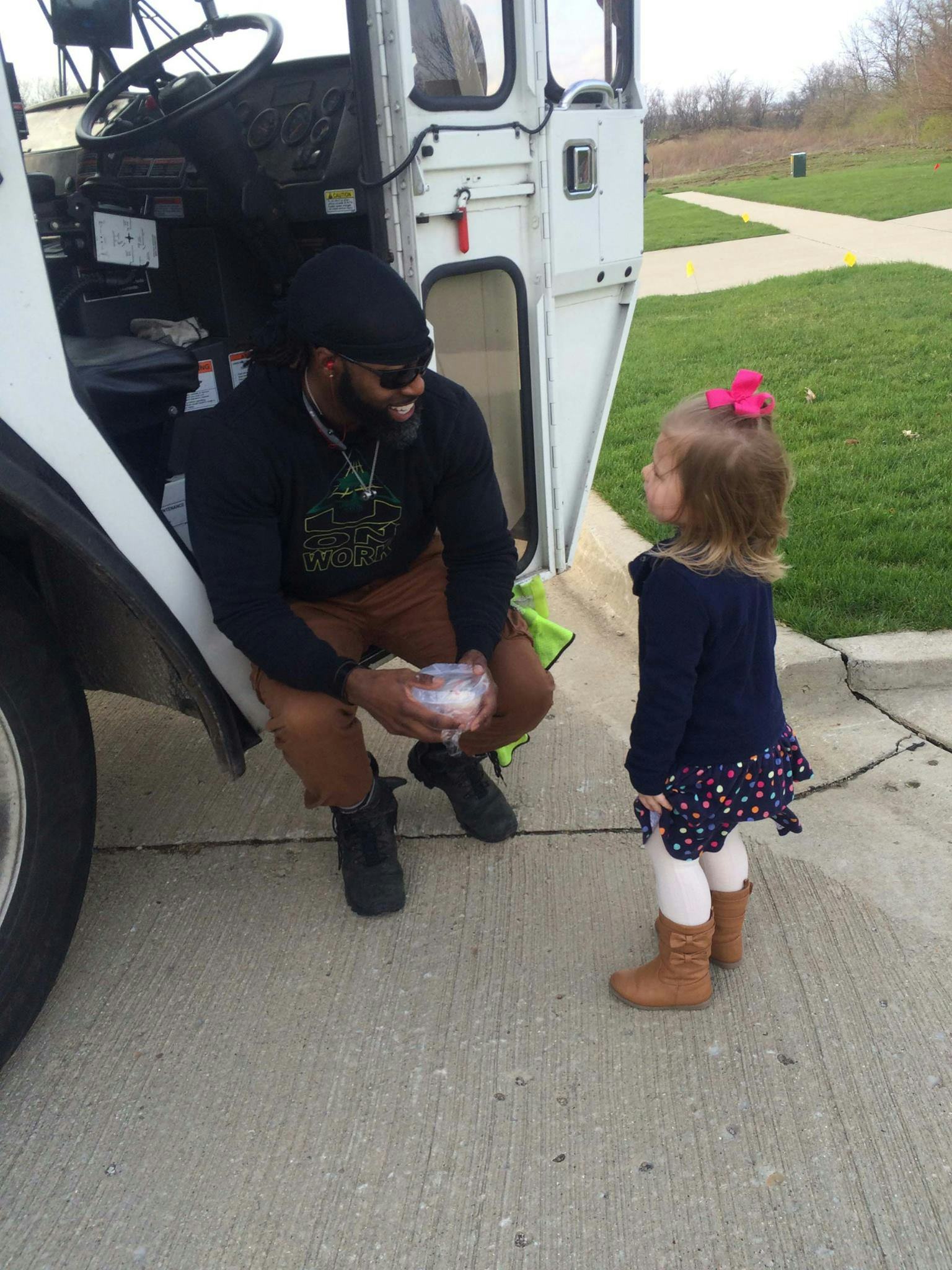 Adorable Little Girl Giving Her Favorite Garbage Man A Cupcake Is Too Cute