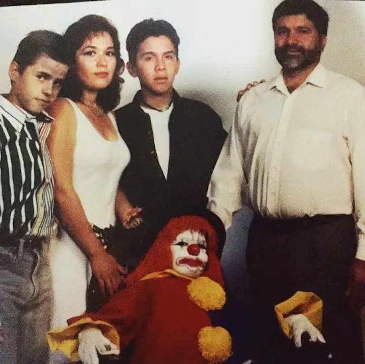 Twitter Is Losing It Over This Bizarre Clown In Family Photo