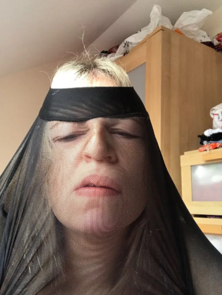 Women Are Struggling To Fit This Mesh Shirt Over Their Heads