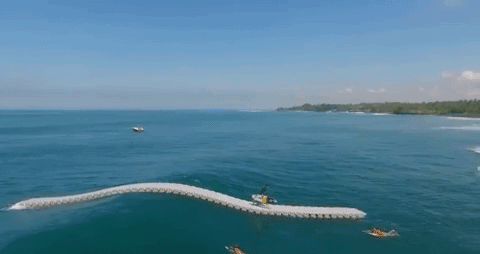 Watch Pro Surfers Try to Catch Waves on This Crazy Floating Dock