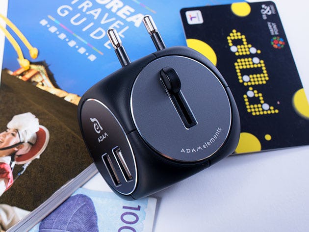 Travel with the World's Smallest Power Adapter to Charge in 150 Countries