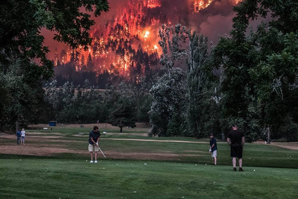 Golfers From Viral "Flaming Golf Course" Photo Reveal What Happened