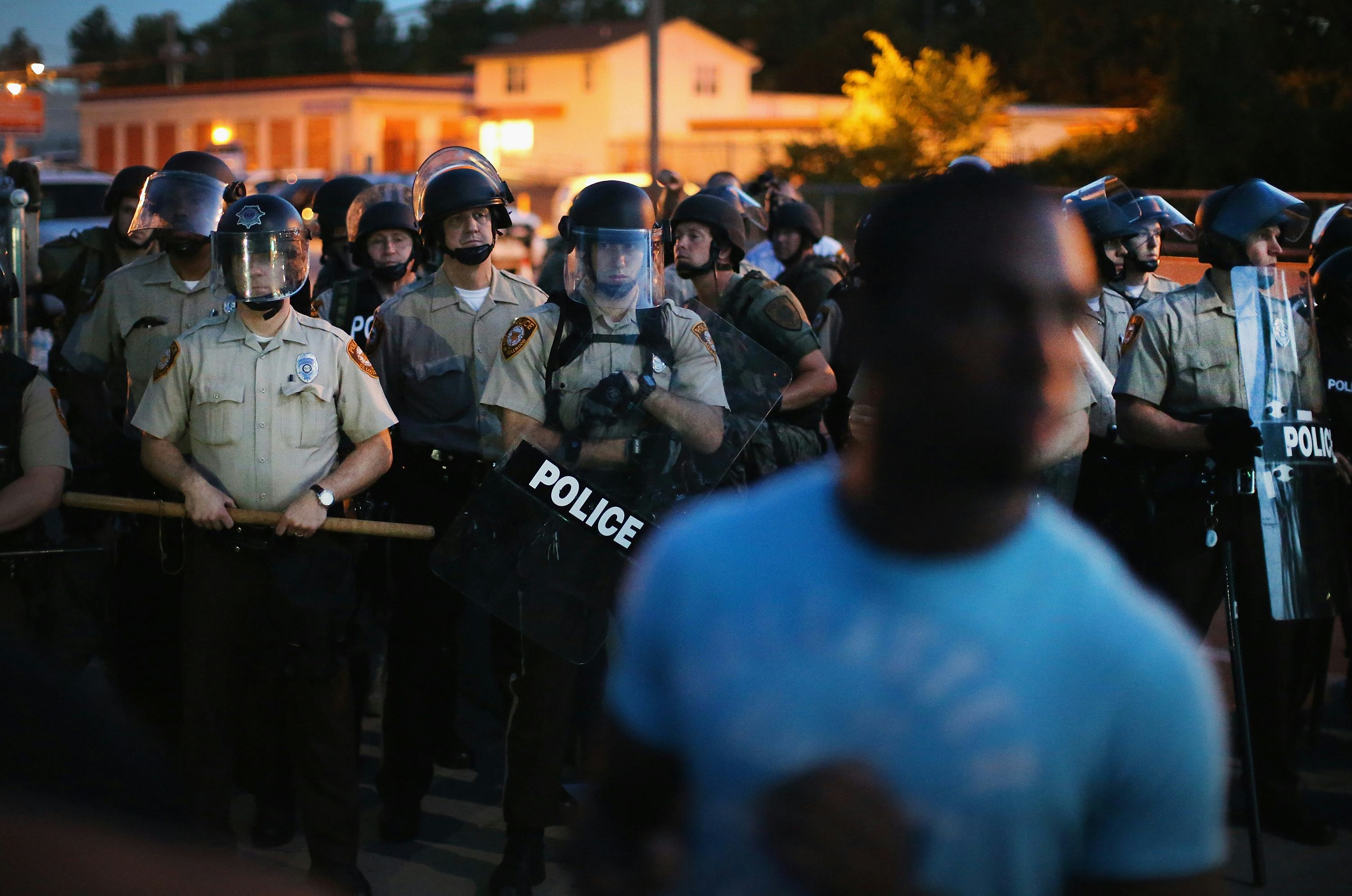 This Photo of a White Cop Hugging A Boy At a Ferguson Rally Has Gone ...