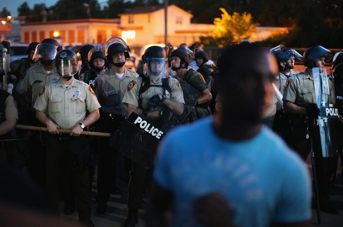 This Photo of a White Cop Hugging A Boy At a Ferguson Rally Has Gone ...