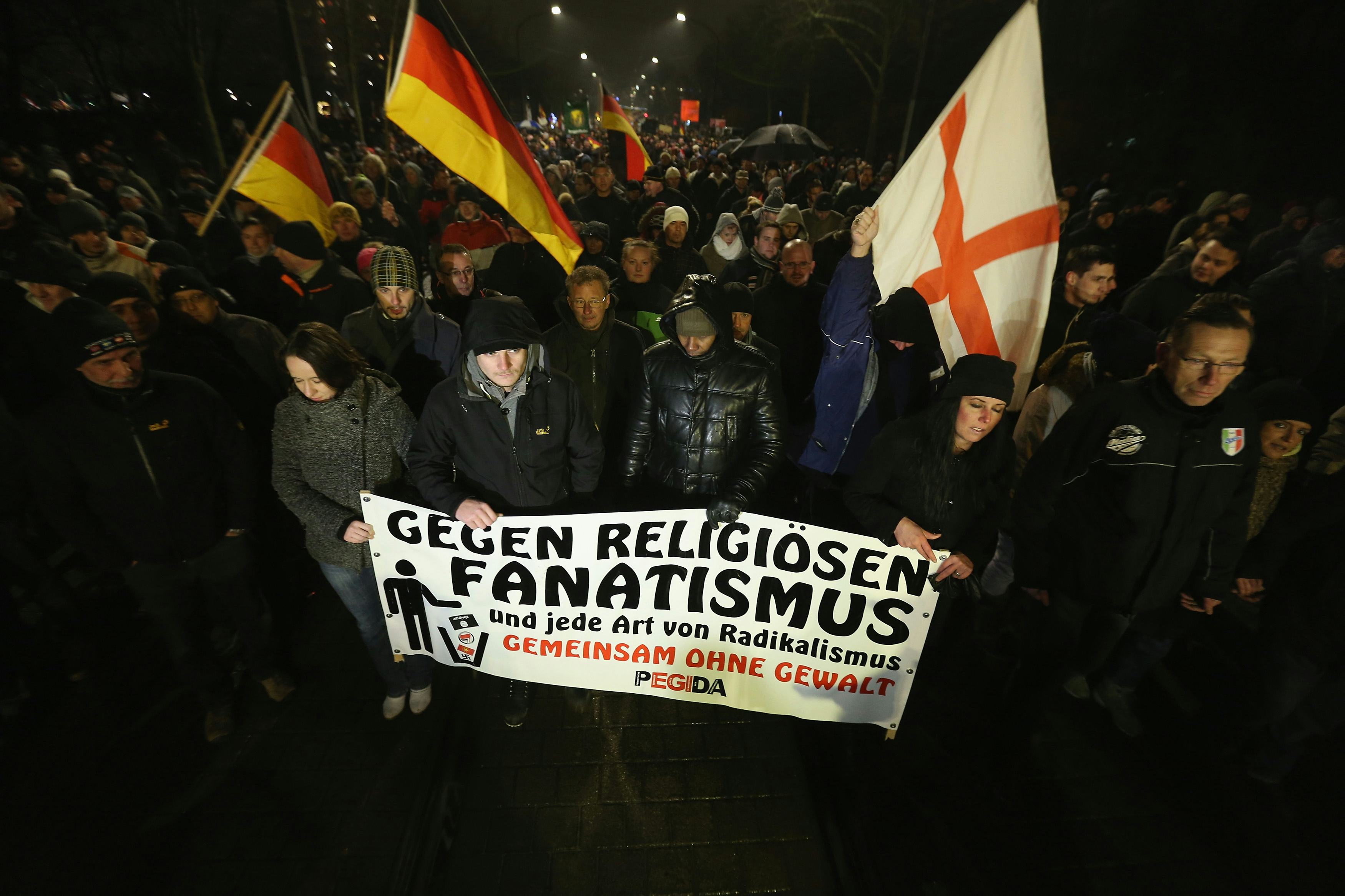 Angela Merkel Leads Muslim Tolerance Rally & Shows Germany How It's Done