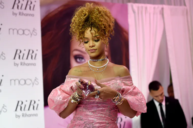 Rihanna Channeled ‘80s Prom Chic In Pink Dress At RiRi Fragrance Launch