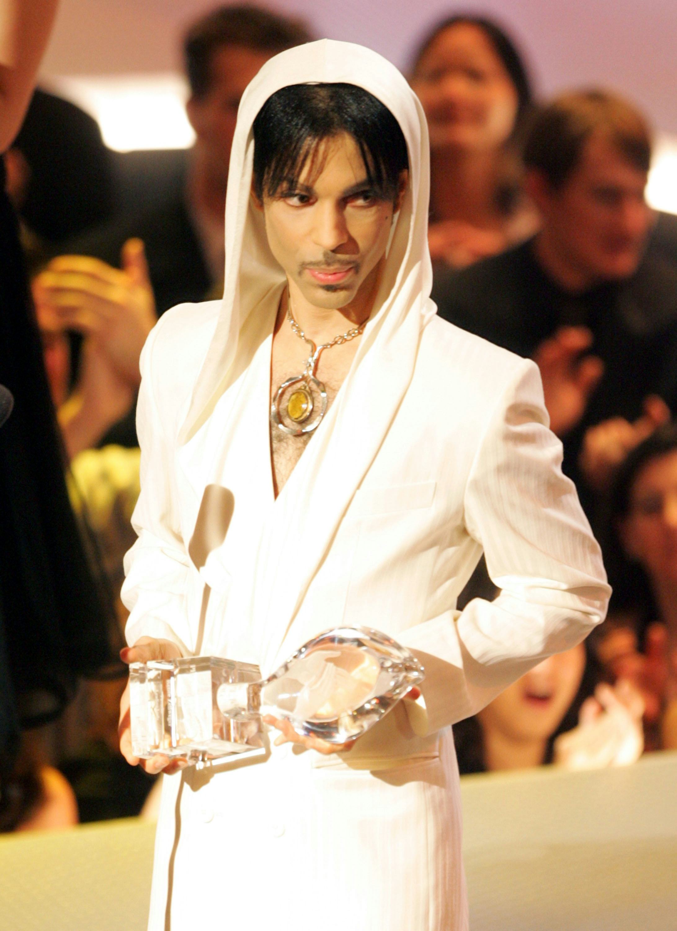 13 Most Influential Prince Outfits To Remind You Just How Stylish He Was