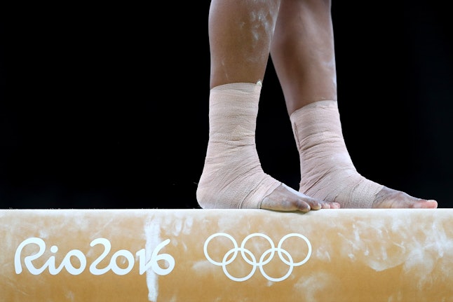 Why Do Gymnasts Tape Their Ankles? It's An Important Safety Precaution
