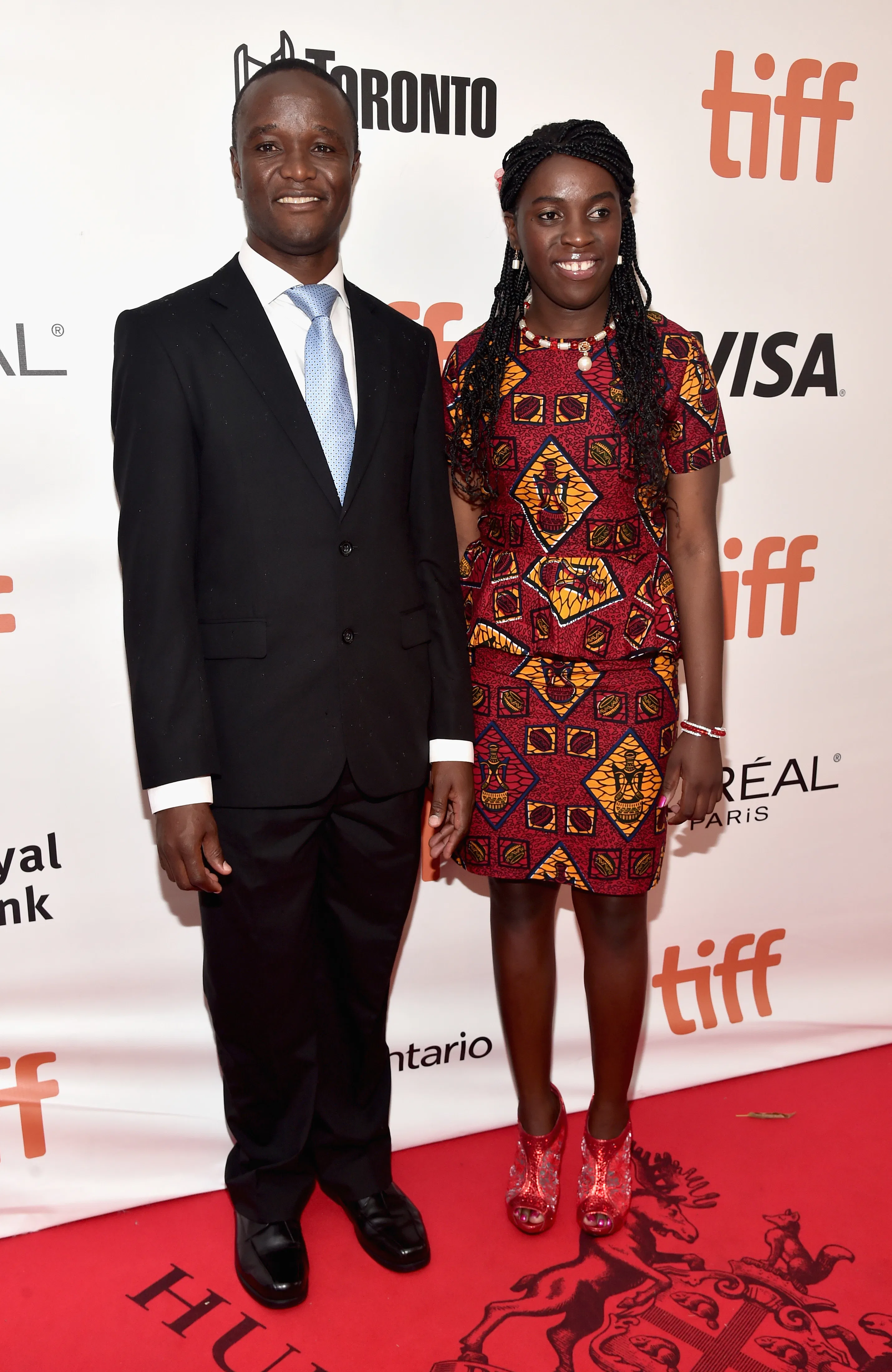 Photos Of The Real Phiona From 'Queen Of Katwe' Show How Far She's Come