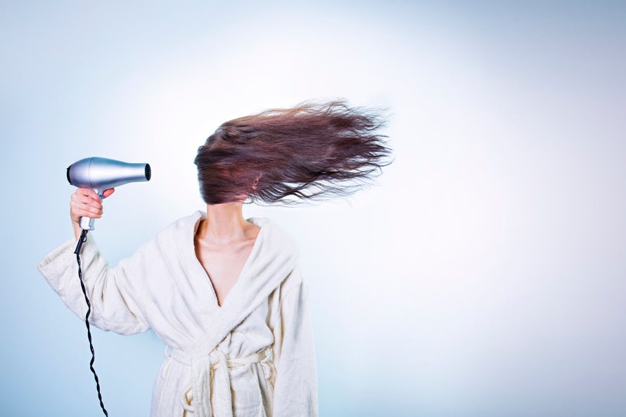 11 Reasons Why Your Hair Is So Dry & What To Do About It