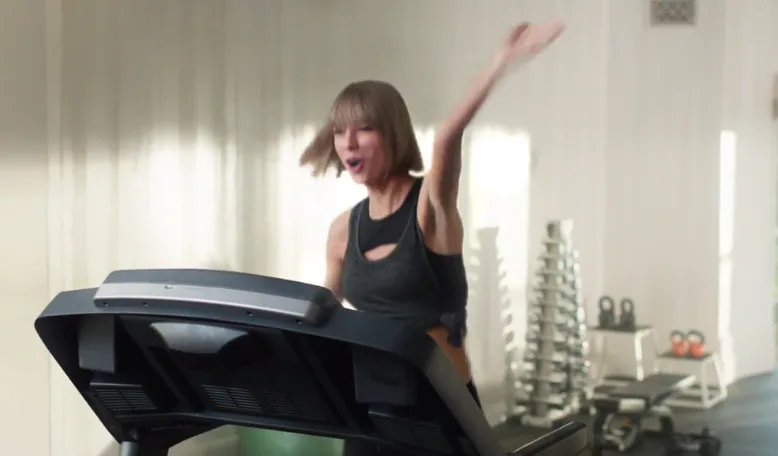 Did Taylor Swift Do The Treadmill Stunt In Her Apple Music Ad? She Does ...