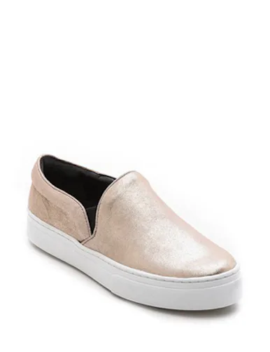 11 Slip On Sneakers That Scream "Chic", Not "High School Punk Phase"