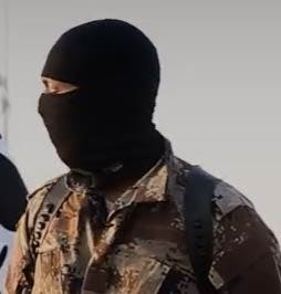 The FBI Wants Your Help Identifying ISIS' Masked Militant With A North ...