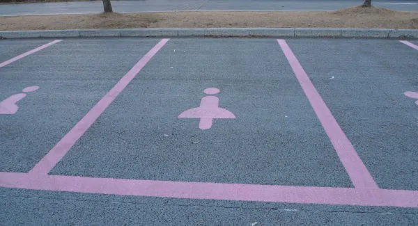Pink, Extra-Wide Parking Spaces For Women Drivers Are Catching On