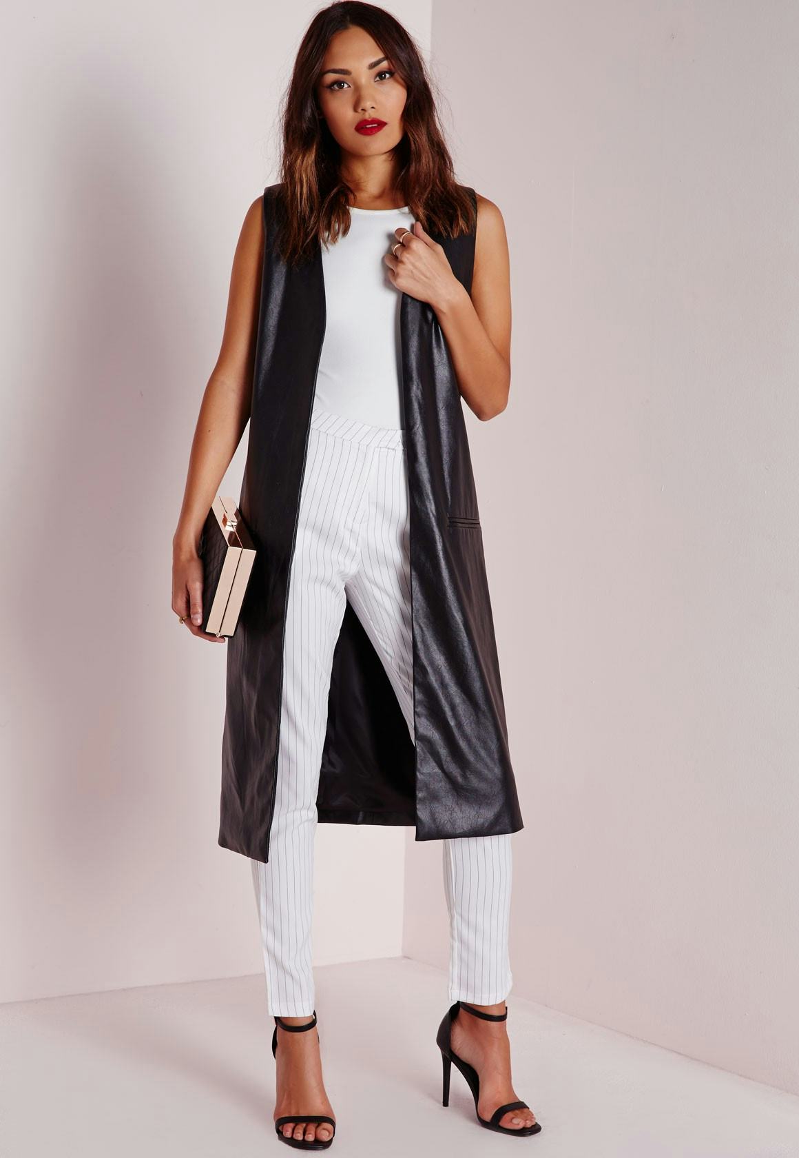 The One Jacket You Need This Fall Doesn't Actually Have Sleeves — PHOTOS