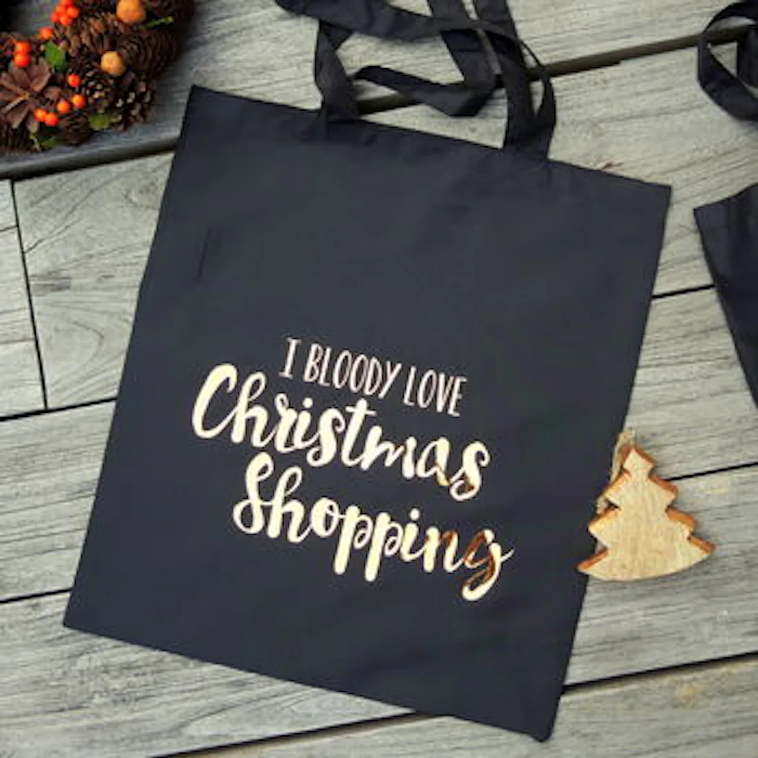 13 Holiday Themed Handbags To See You Through The Festive Season