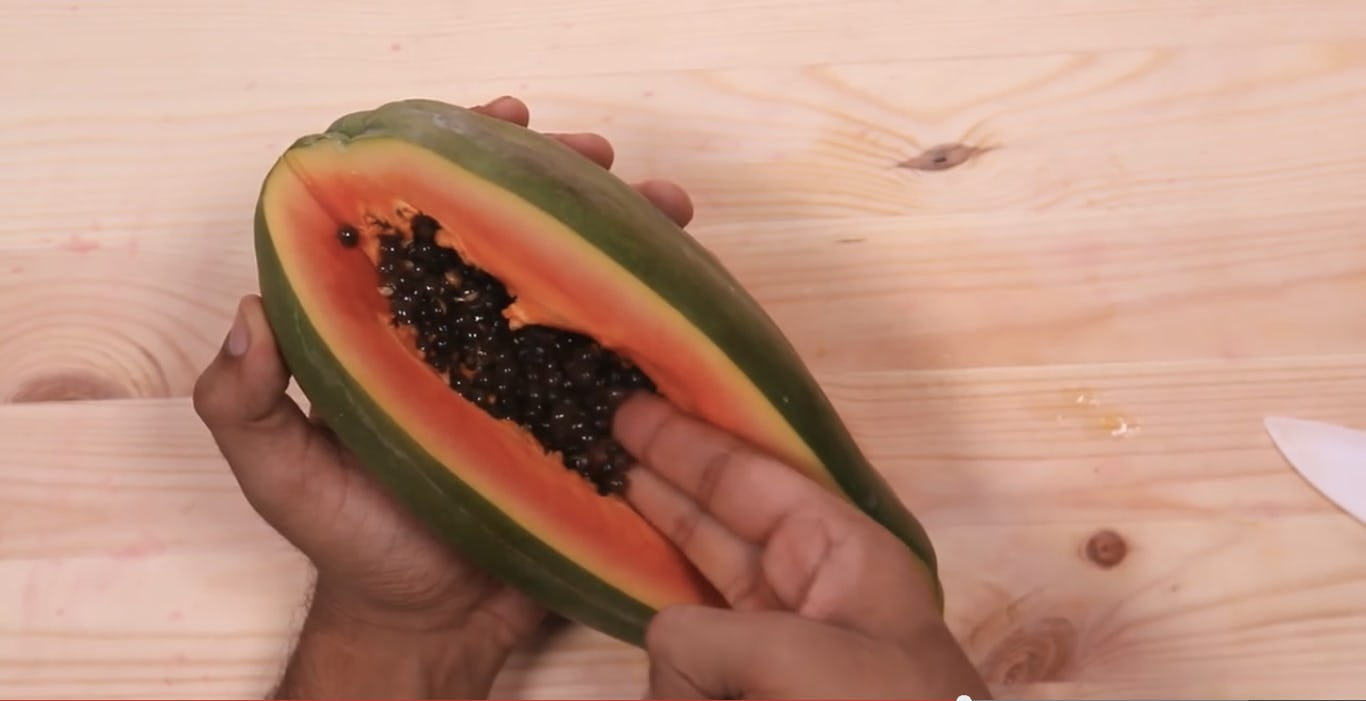 Men Practice Their Fingering Techniques On Fruit — VIDEO