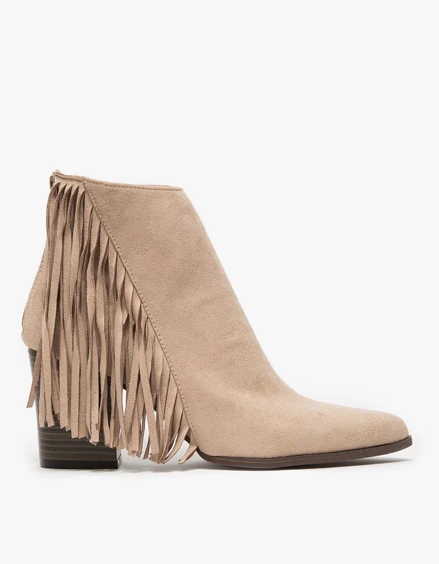 How To Pull Off Fringe Without Looking Too Much Like A Cowboy