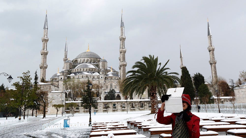 11 Stunning Photos Of the Historic Snow Storm Hitting the Middle East