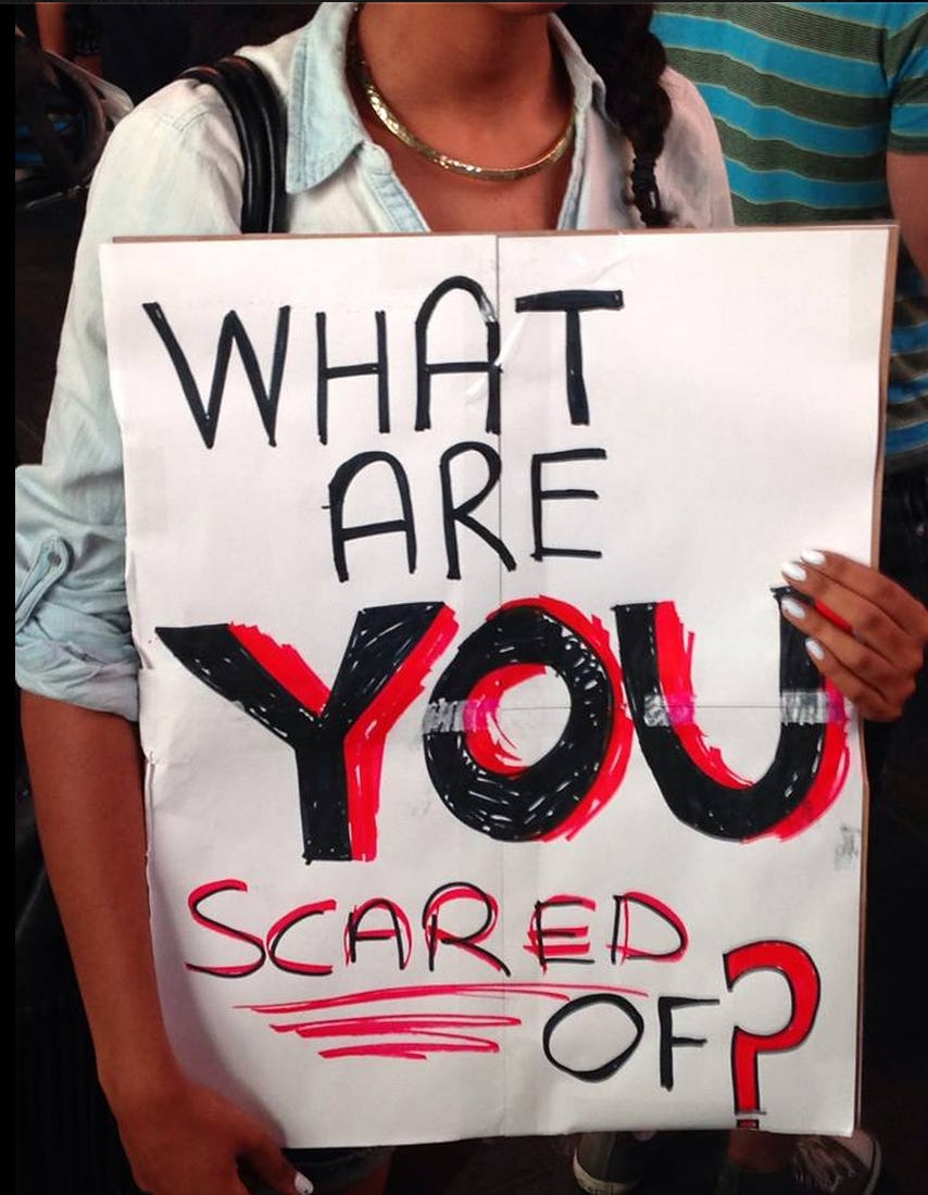 20 Powerful Protest Signs That Prove America Stands with Ferguson
