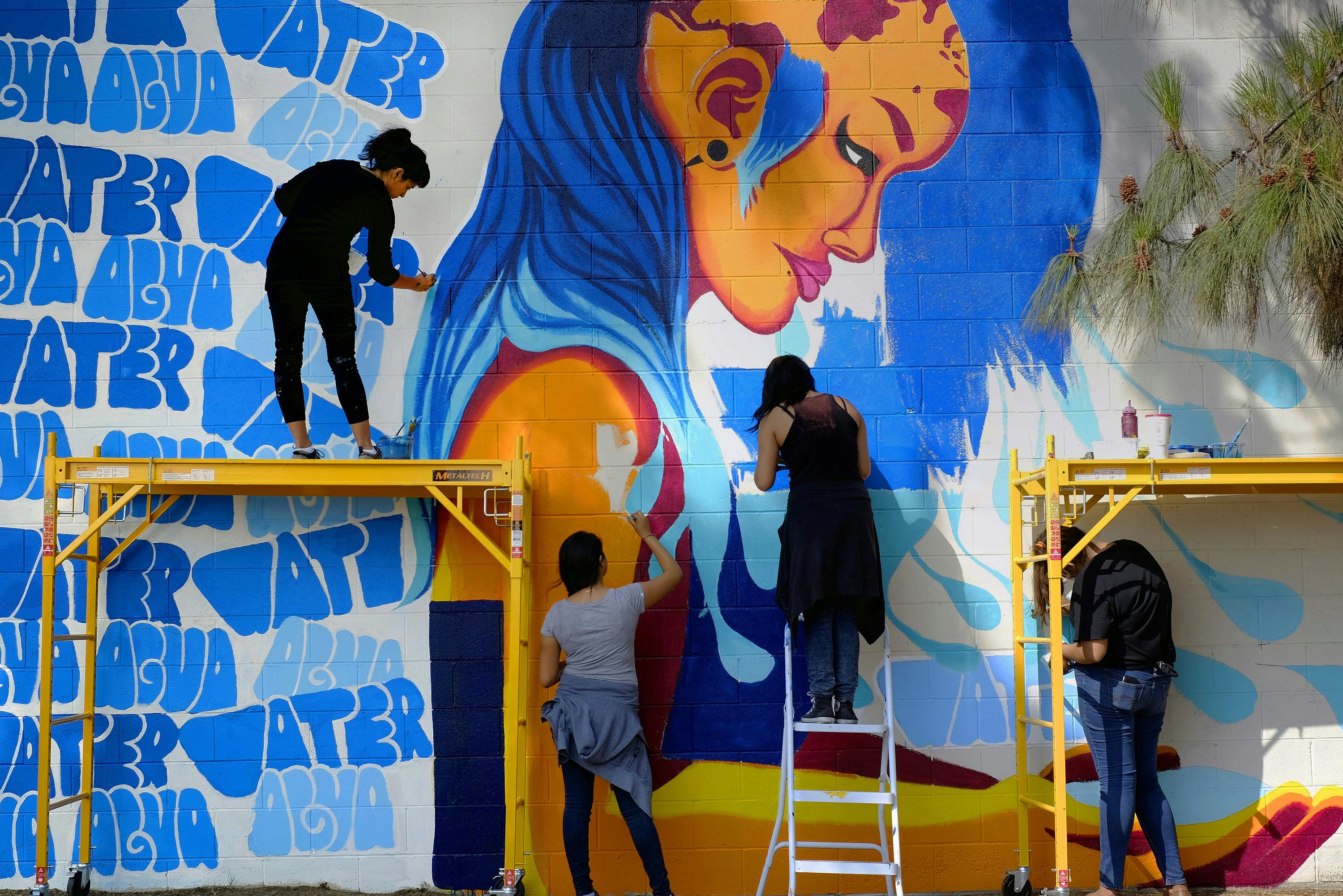 These Latino Street Artists Are Transforming Los Angeles' Walls Into ...