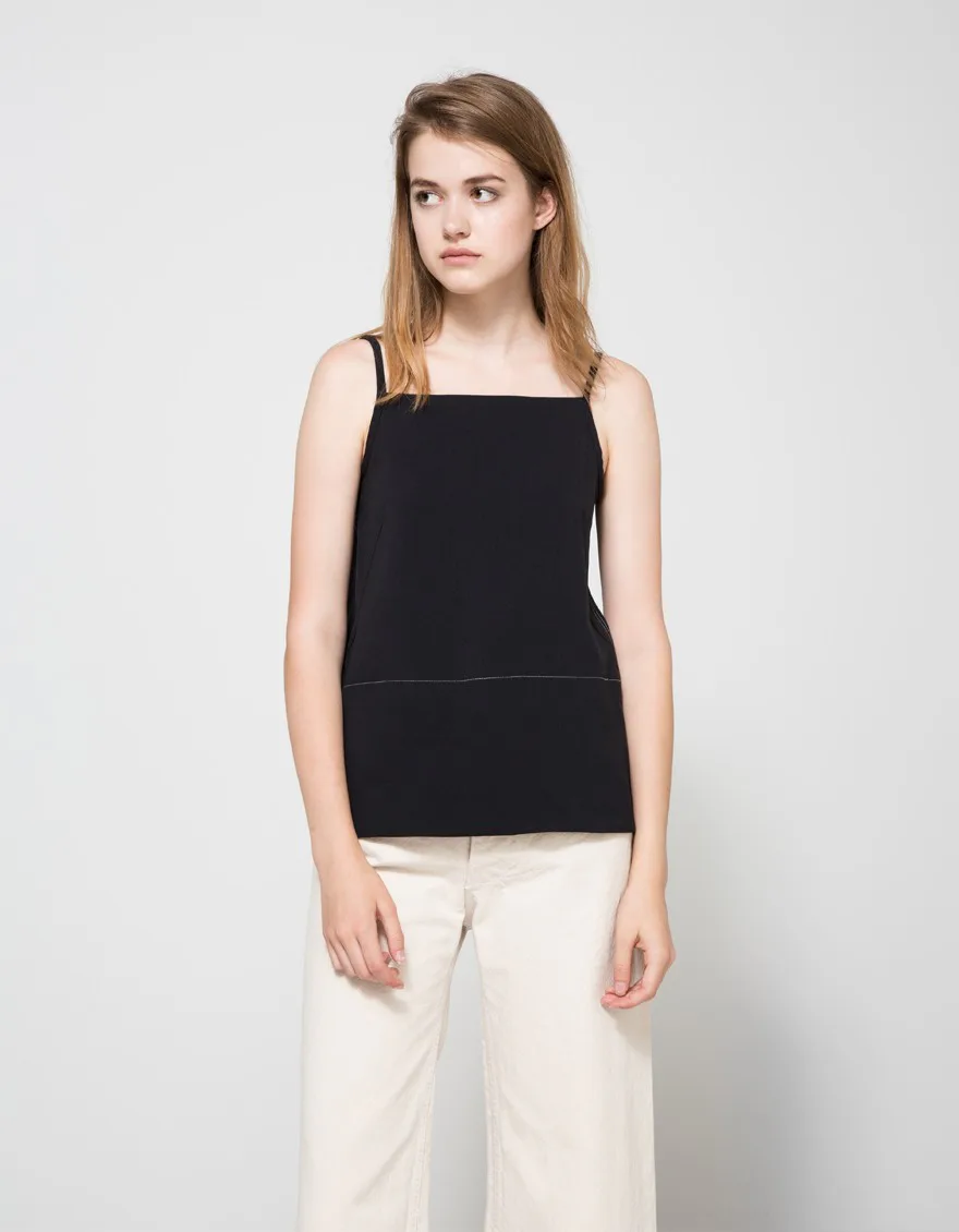 This Summer’s Best Shirt Is The Apron Top