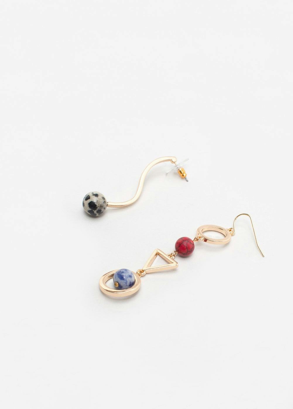 17 Pairs Of Mismatched Earrings We’re Obsessing Over