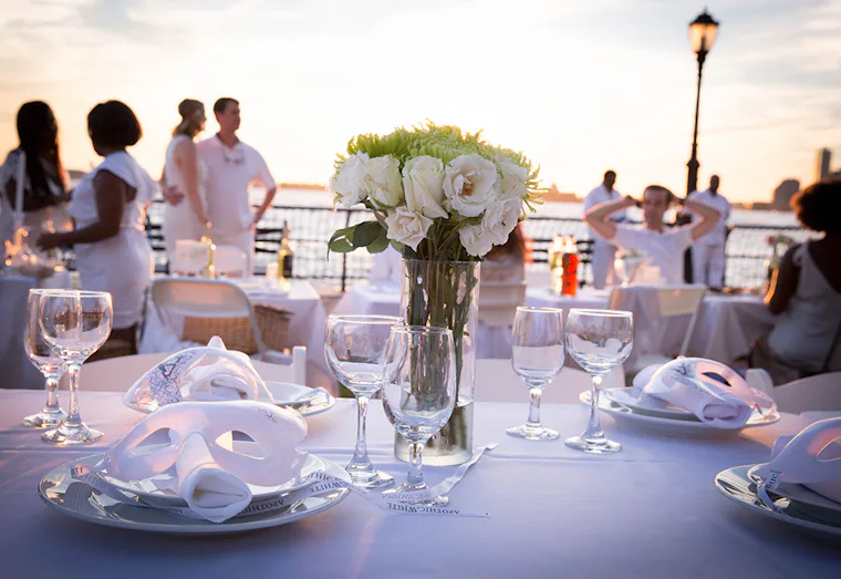 Why Thousands Of People Dressed In White Converge For A Secret Dinner Party