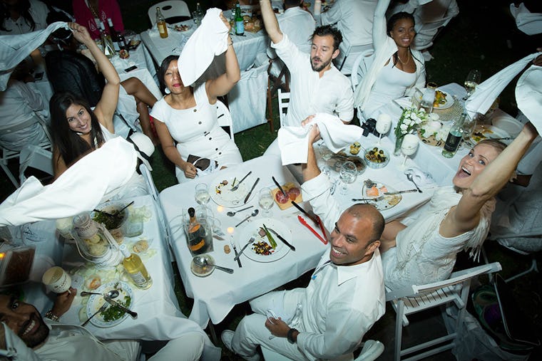 Why Thousands Of People Dressed In White Converge For A Secret Dinner Party