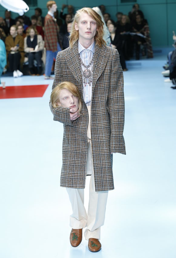 Gucci Sent Models Down The Runway Carrying Their Own Heads