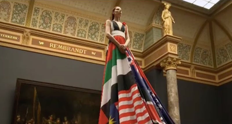 Transgender Model Wears Dress Of Flags Where Homosexuality Is Forbidden