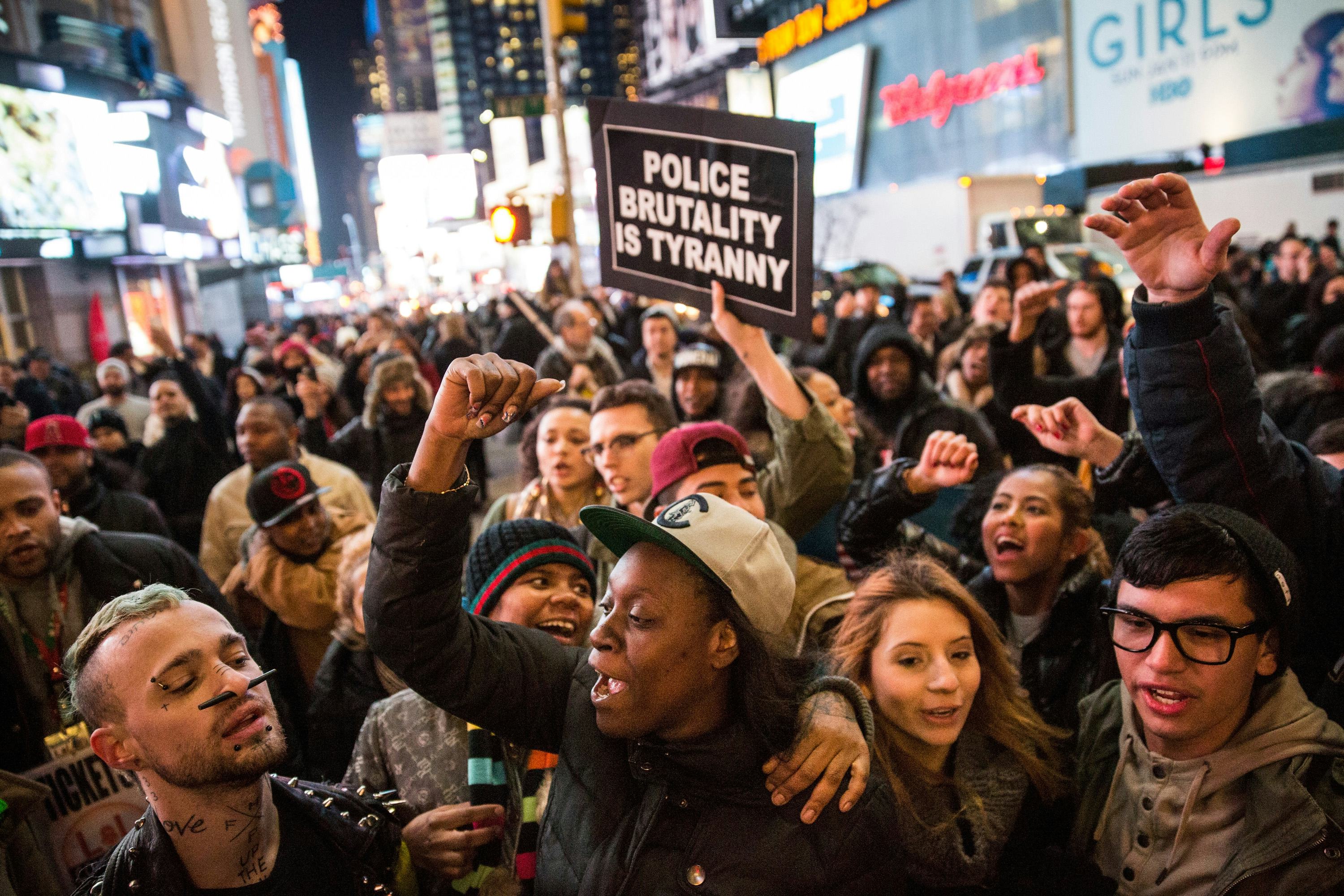 Eric Garner Protests In Times Square Attract Hundreds — PHOTOS