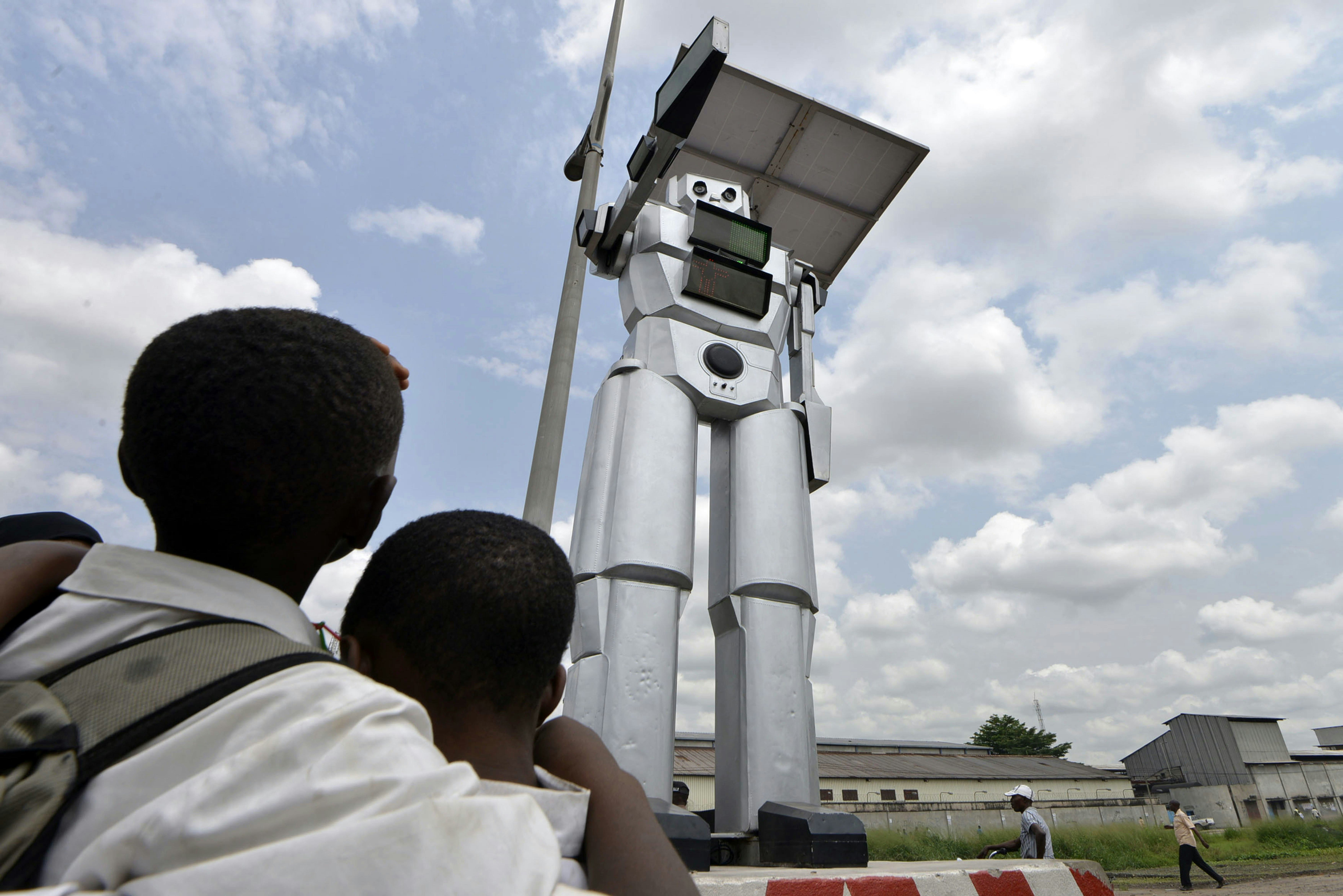 Actual Robot Cops Are Patrolling Kinshasa, Congo, Directing Traffic ...