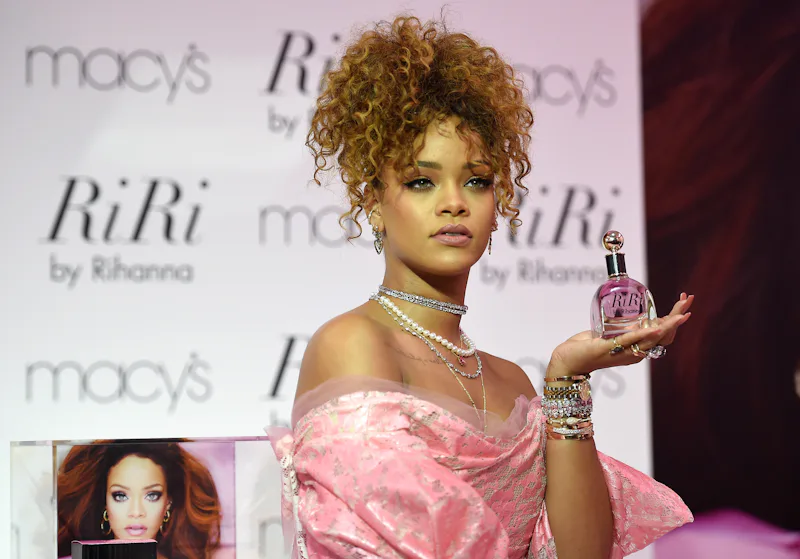 Rihanna Channeled ‘80s Prom Chic In Pink Dress At RiRi Fragrance Launch