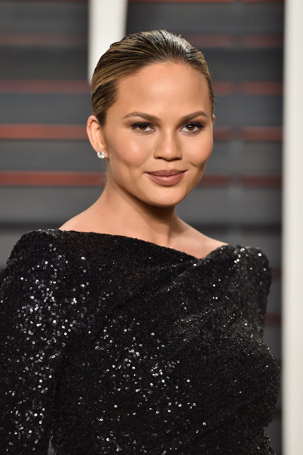 Chrissy Teigen's See Through Shirt & Bra Combo Will Give You All The ...
