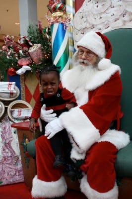 25 of The Saddest Santa Pictures Ever