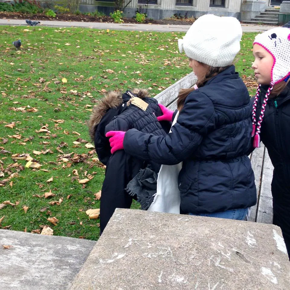 8-Year-Old Celebrates Birthday By Tying Coats To Lamp Posts For Homeless