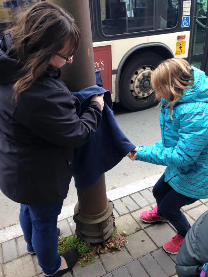 8-Year-Old Celebrates Birthday By Tying Coats To Lamp Posts For Homeless