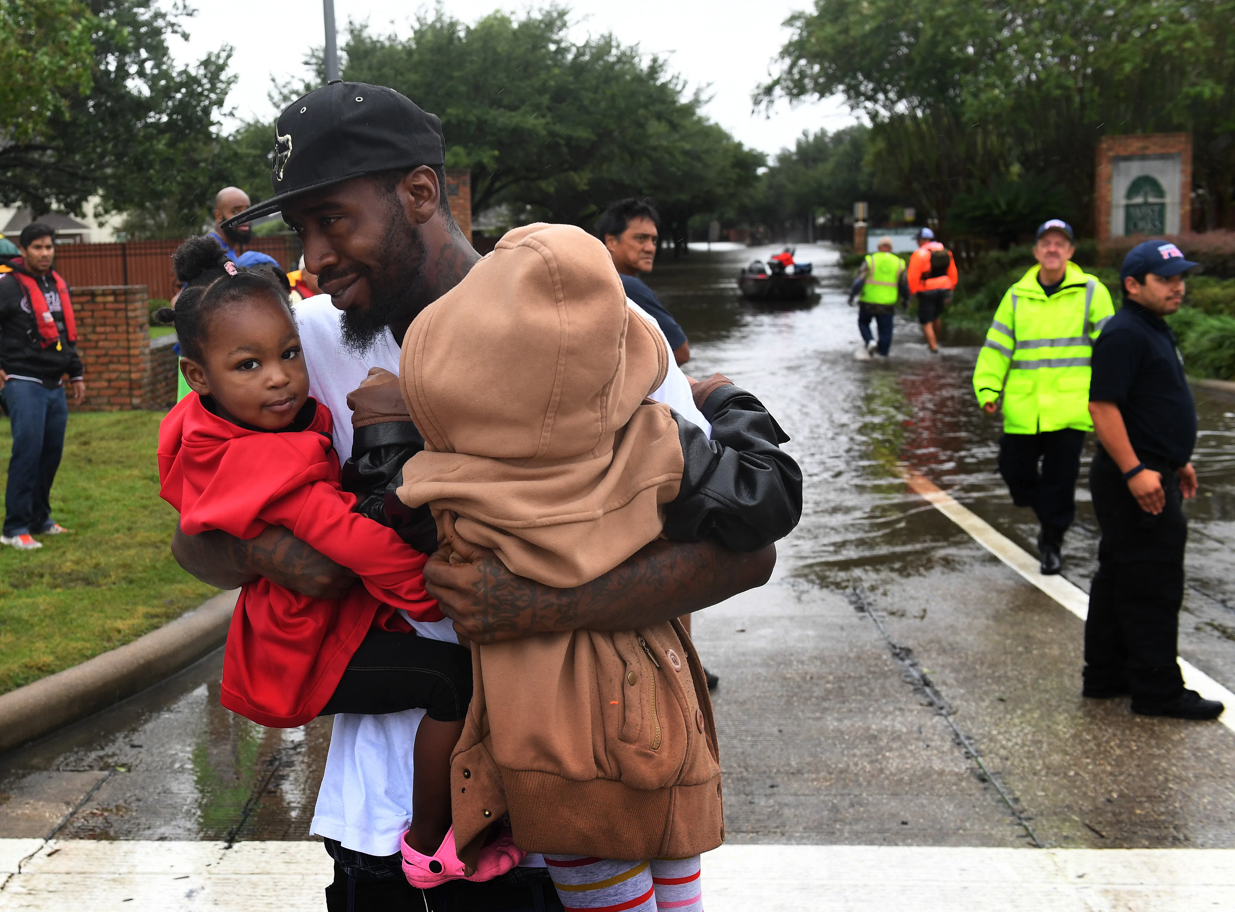 Photos Of Children Being Rescued From Flood Waters Will Stop Any Parent ...