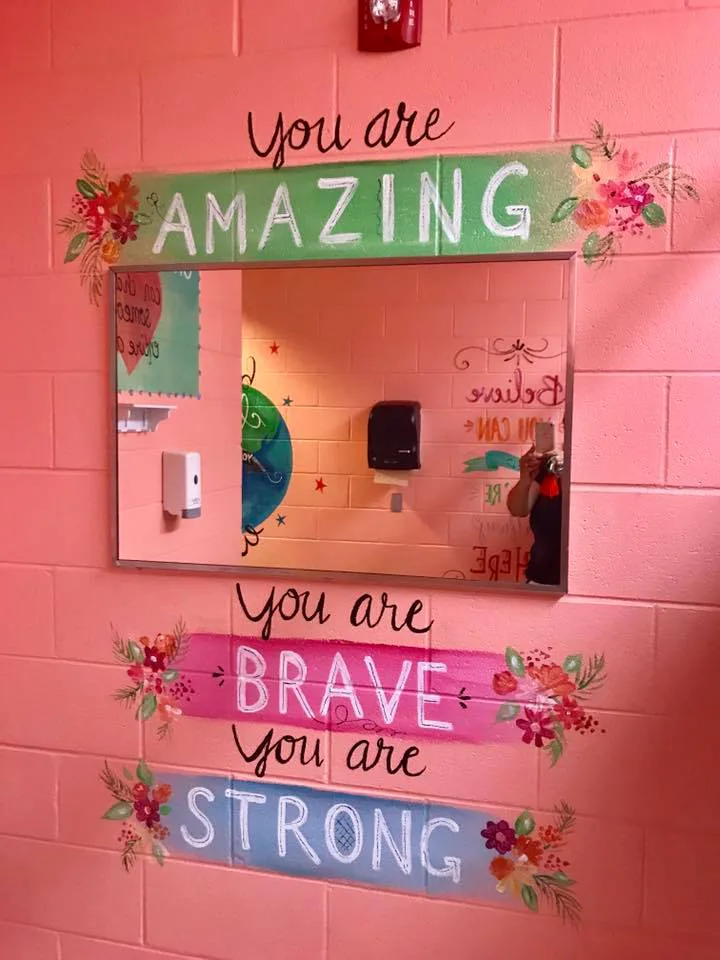 These Bathroom Murals Have Just The Messages Teenage Girls Need To Read