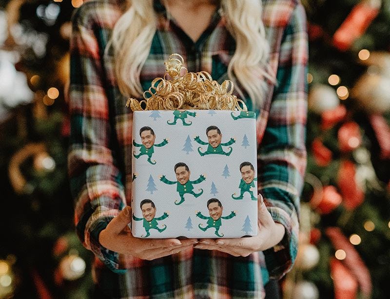 Be Extra AF This Holiday Season With Gift Wrap Covered In Your Own Face