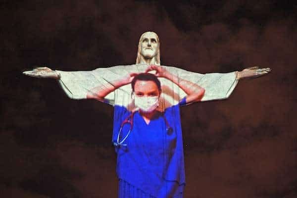 Brazil’s Christ The Redeemer Statue Was Lit Up As A Doctor On Easter
