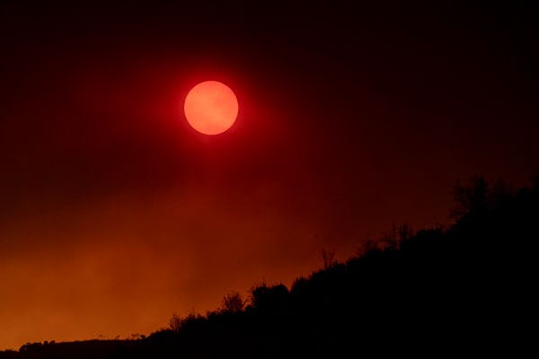 Wildfire Photos Show Apocalyptic Red Skies Across Western U.S.