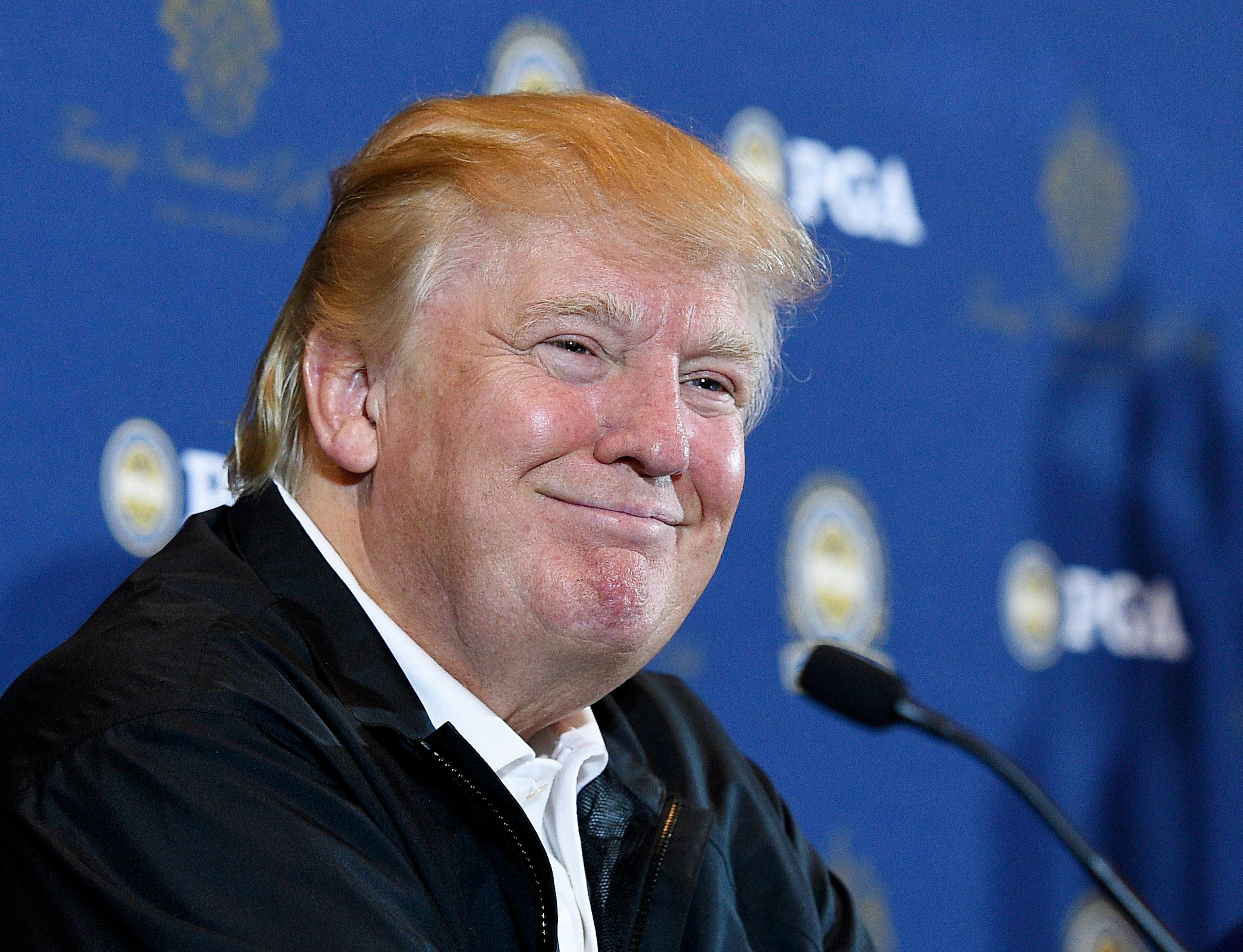 13 Photos Of Donald Trump's Hair, Through Thick & Thin
