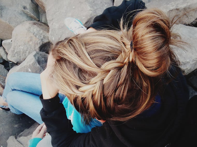 6 Ways To Protect Your Hair In The Snow, According To An Expert