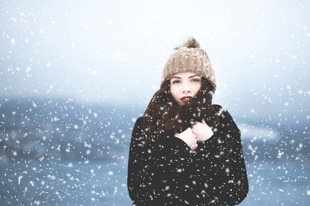 6 Ways To Protect Your Hair In The Snow, According To An Expert